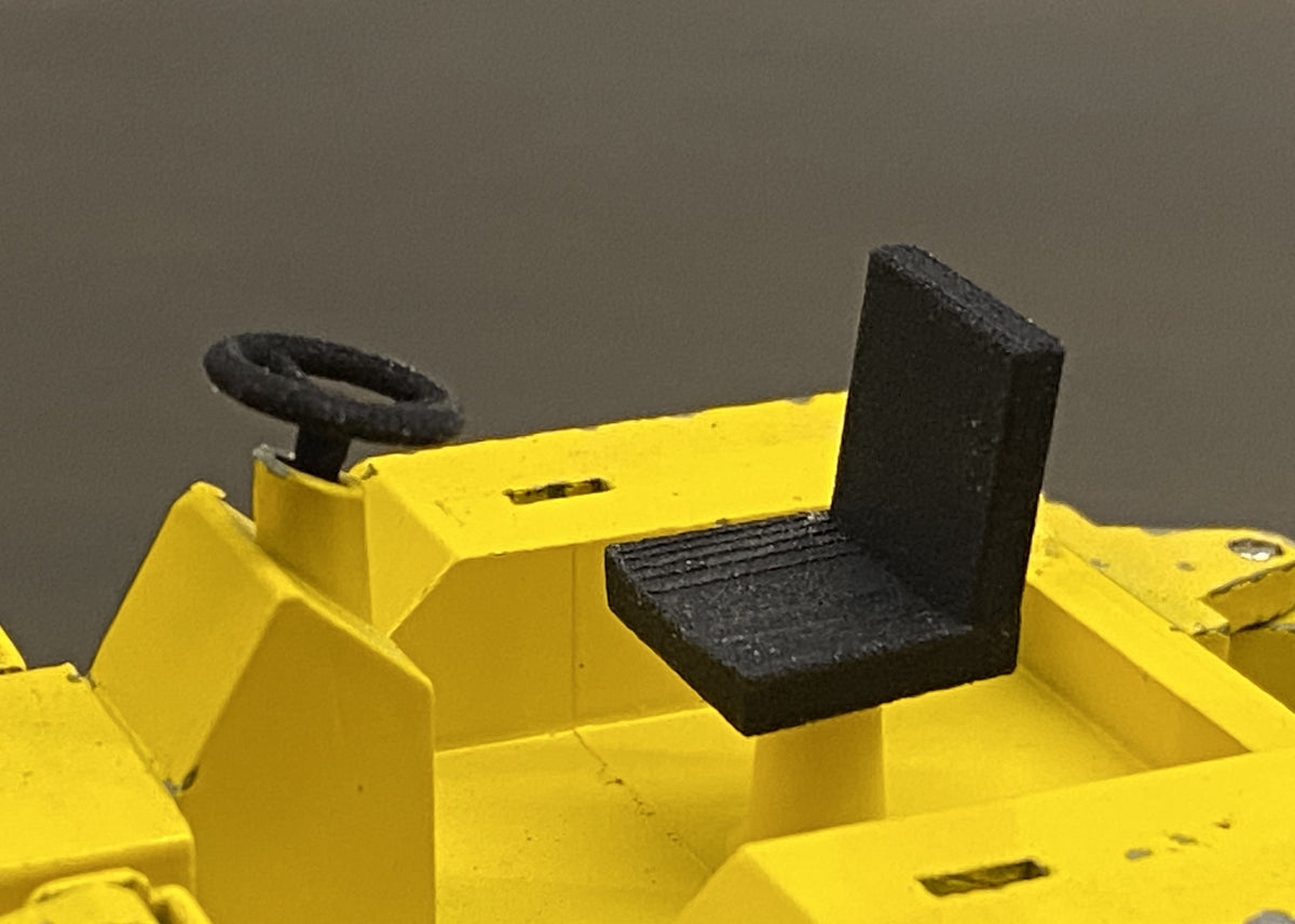 1:35 Scale NZG JCB 3CX Replacement seat and steering wheel – CiModels